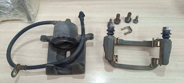 Купить Суппорт передний левый NZE124 4WD Toyota Corolla Fielder 2001г ...